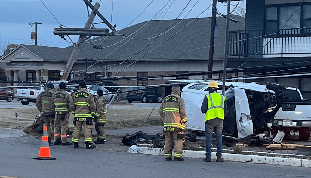 Rollover crash into power lines in NW OKC